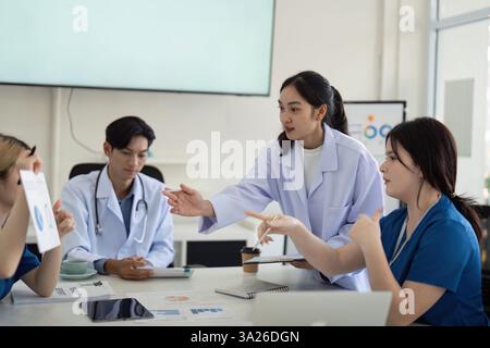 Problem solving - Healthcare professionals at work. A team of medical ...