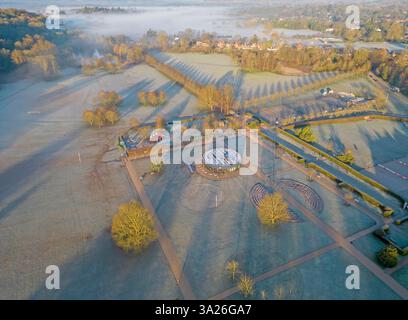 aerial view of low mist at reigate priory park on a cold and frosty ...