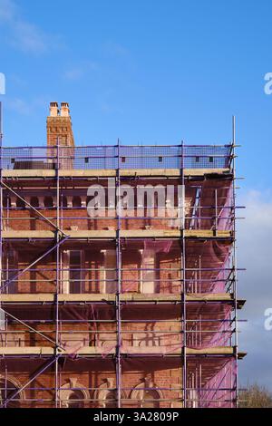 scaffolding erected against an old building Stock Photo - Alamy