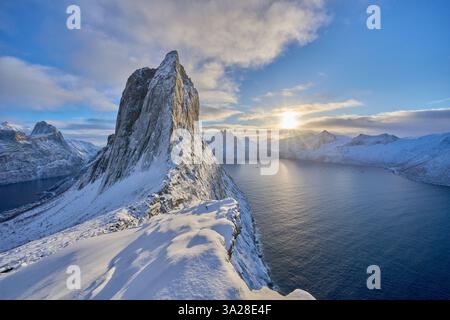 icy winter landscape of the snowy Segla summit near Fjordgard, the most ...