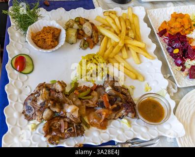 Traditional spiced Moroccan lamb ragout with filo pie served as close ...