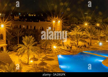 Kasbah-Hotel Chergui. Pool and garden of a maroccan kasbah hotel at ...