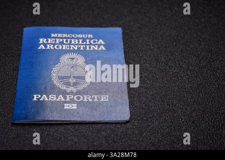 International biometric passport of a citizen of Argentina on the dark ...
