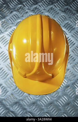 Safety building helmet on grooved metal sheet Stock Photo - Alamy