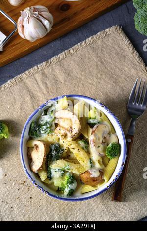 Real pasta with mushrooms, spinach and broccoli Stock Photo - Alamy