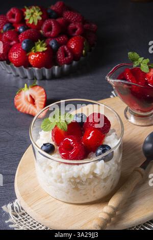 Delicious rice pudding jelly with various berries and red fruits Stock ...