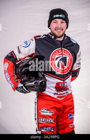 Mason Watson of Belle Vue Colts in Blue chases Ace Pijper of ...