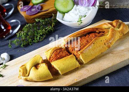 Pide with minced meat, spinach, feta and feta cheese Stock Photo - Alamy