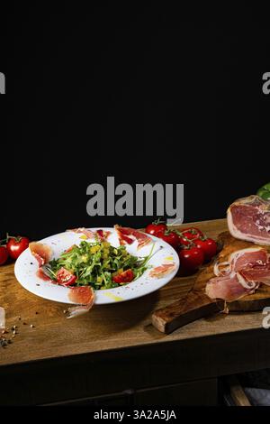 Rocket salad with dried Spanish ham Stock Photo - Alamy