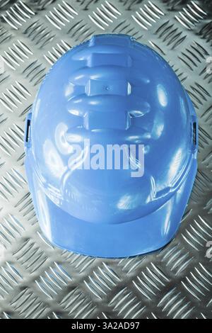 Safety building helmet on grooved metal sheet Stock Photo - Alamy