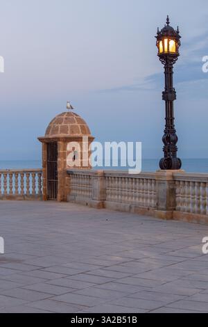 A scenic waterfront promenade in Cádiz, with Playa de Santa María del ...