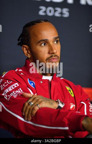 Ferrari driver Lewis Hamilton of Britain steers his car during the ...