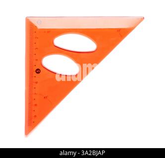 Orange triangle plastic ruler on white background Stock Photo - Alamy