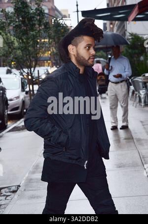 Canadian singer The Weeknd arrives at a downtown hotel on September 10 ...