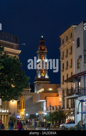 Night view down Caseros Street in the historic center of Salta ...
