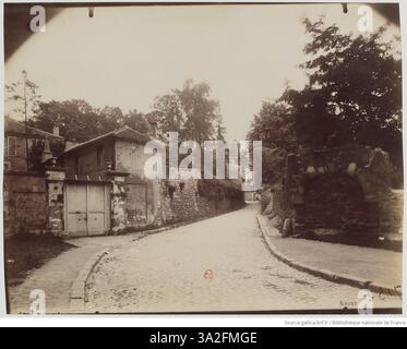 This image by Eugène Atget captures an old street in Vanves, Paris ...