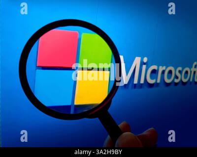 In this photo illustration a Microsoft logo is seen displayed on a ...