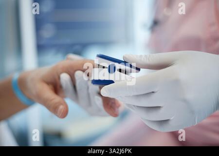 A close-up wellness scene showing a female hand gently playing a ...