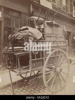 This image, taken in 1908, depicts a vegetable market scene, showcasing ...