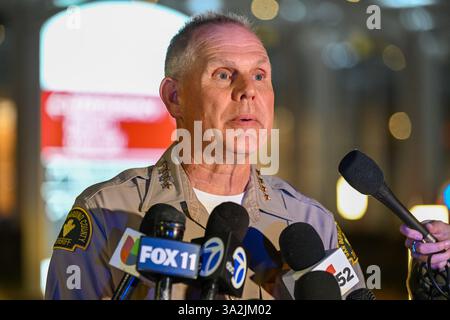 San Bernardino County Sheriff Shannon Dicus salutes during funeral ...