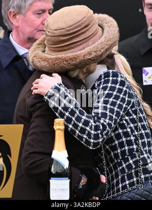 Queen Camilla (left) speaks with Charlotte Giles, girlfriend of the ...