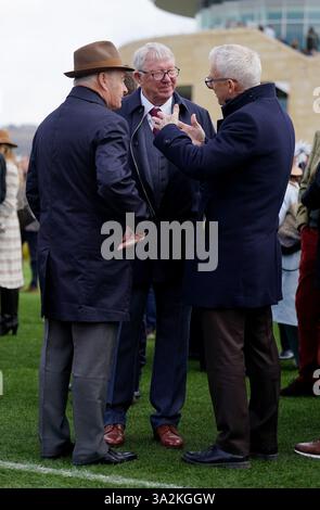 Sir Alex Ferguson (centre) on day three of the 2025 Cheltenham Festival ...