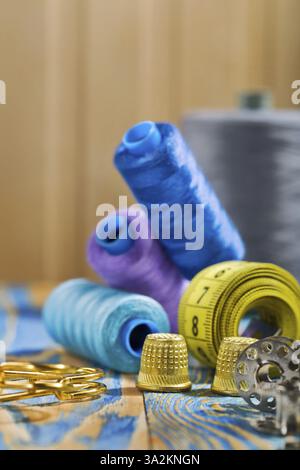 vintage sewing items on old wooden board Stock Photo - Alamy