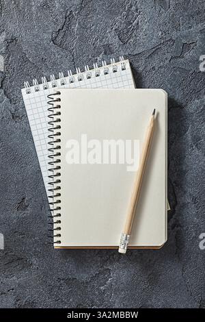 Two Classic Notepads On Stone Background Stock Photo - Alamy