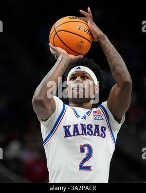 MAR 12 2025: Kansas Jayhawks guard Dajuan Harris Jr. (3) drives for a ...