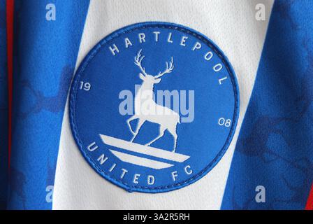 Close up photo of Hartlepool United FC club badge on the home shirt ...