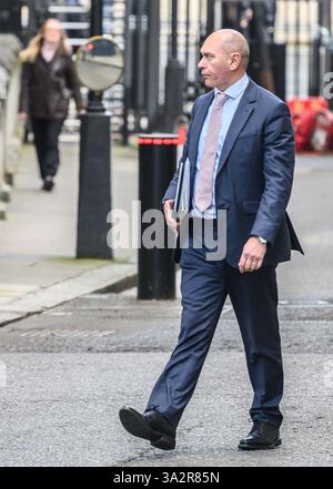 Sir James Mackey - interim CEO of NHS England - entering Downing Street ...