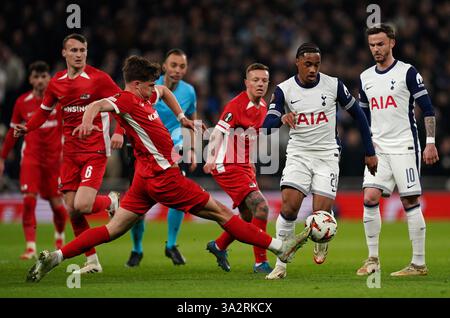 Wilson Odobert of Tottenham Hotspur goes down injured during the ...