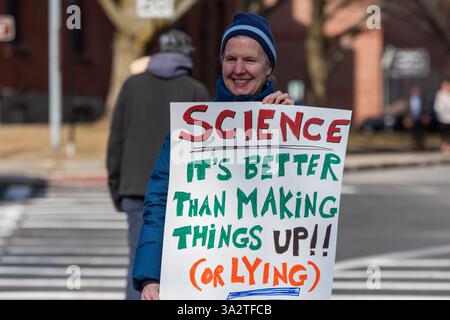 A group organized by Concord Indivisible, rallying in Concord Center ...