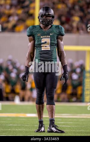 Baylor Bears defensive end Shawn Oakman (2) attack the line against ...