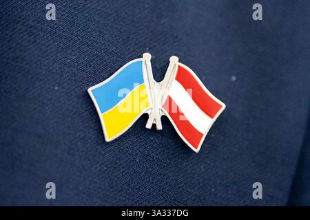 Austrian and Ukrainian flag pin seen at visit of Austrian Foreign ...