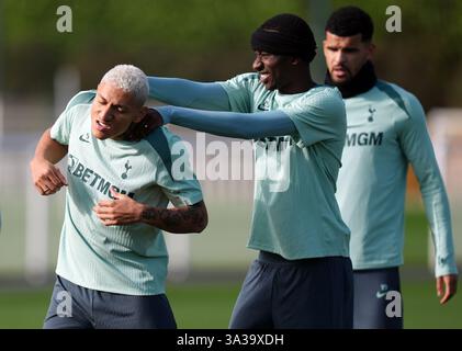 Tottenham Hotspur's Richarlison with Pape Matar Sarr following the ...