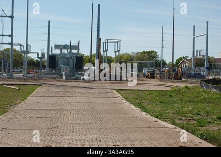 A low angle shot of a pile of metal rusty rails under a blue sky Stock ...