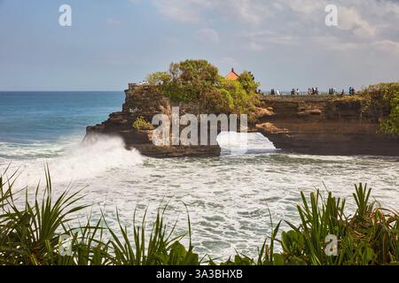 A scenic view of the Pura Batu Bolong temple in the Tanah Lot in the ...