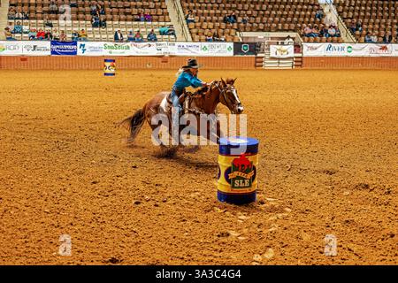 Women's barrel racing on horseback at the PRCA Rodeo Slack event in ...