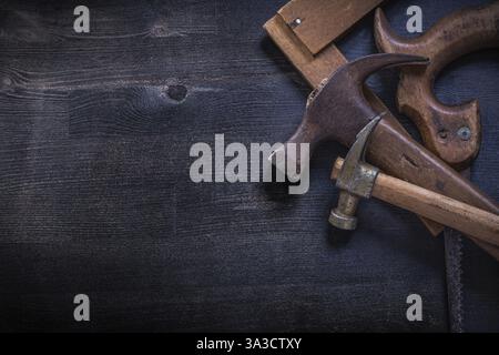 Vintage square ruler claw hammers hand saw construction concept Stock ...