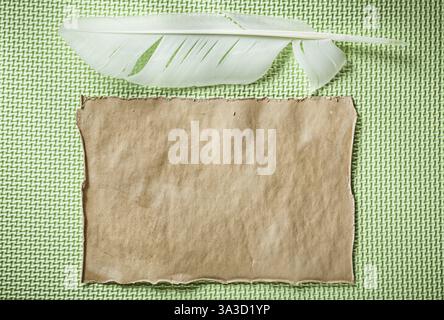 Vintage paper plume on green background horizontal image Stock Photo ...