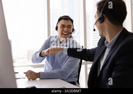 Man agent operator with headset giving support. At a modern office ...