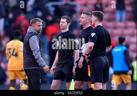 Southampton goalkeeping coach Dean Thornton addresses the officials ...
