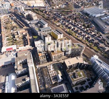 Aerial view of The Old Vinyl Factory, London, UK. Buildings, roads, and ...
