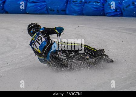 Filip Jäger (719) of Sweden in White rides inside Franz Zorn (100) of ...