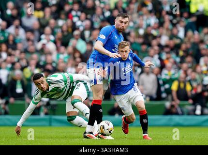 Rangers' John Souttar (left) battles for the ball with Kilmarnock's ...