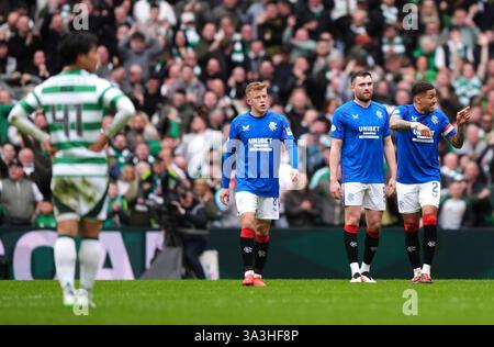Celtic's Reo Hatate (right) scores his sides first goal during the ...