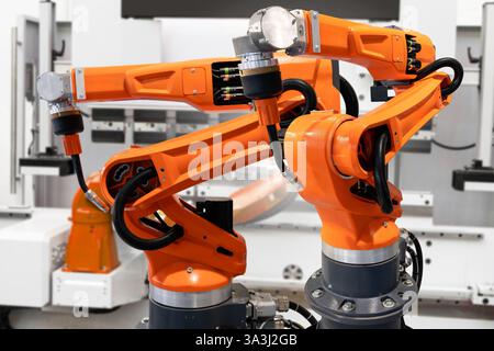 Automatic welding robots on a smart factory Stock Photo - Alamy