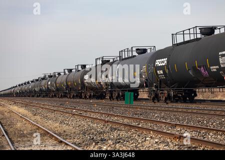 A freight train with tanker cars on rail tracks Ontario Canada Stock ...