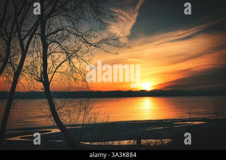 A January sunrise on Lake Michigan at Red Arrow Park in Manitowoc ...